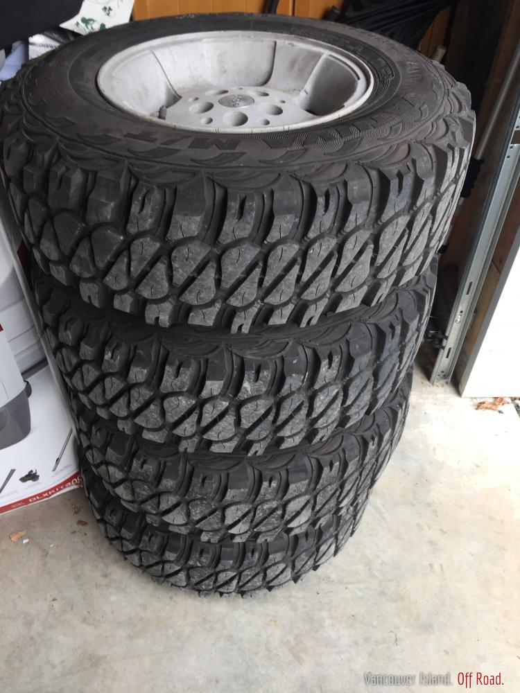 SOLD : Set of 4 15" Nokan Vativa M/T Tires (30x9.5x15) and 15 inch Jeep ...